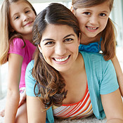 Relaxing with her two beautiful daughters | Buy Stock Photo on ...
