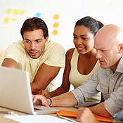 Going over statistics | Buy Stock Photo on PeopleImages, Picture And ...