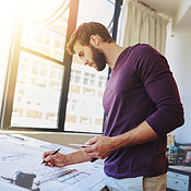 Finalizing the plans | Buy Stock Photo on PeopleImages, Picture And ...