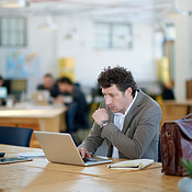 Carefully planning his project | Buy Stock Photo on PeopleImages ...