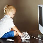 His first computer - Baby Genius | Buy Stock Photo on PeopleImages ...