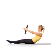 Roll up exercise with her pilates ring | Buy Stock Photo on ...