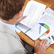 Crunching the numbers | Buy Stock Photo on PeopleImages, Picture And ...
