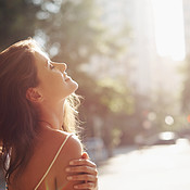 Enjoying the sun on her skin | Buy Stock Photo on PeopleImages, Picture ...