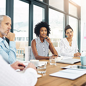 They're all intrigued by her ideas | Buy Stock Photo on PeopleImages ...