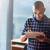 Fast-track tasks with technology | Buy Stock Photo on PeopleImages ...