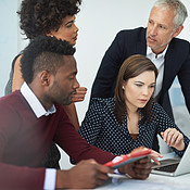 Getting the job done with teamwork | Buy Stock Photo on PeopleImages ...