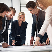 Making a few minor changes to their plans | Buy Stock Photo on ...
