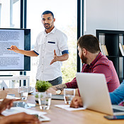 Delivering the facts and figures | Buy Stock Photo on PeopleImages ...