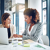 Working meticulously through their top strategies | Buy Stock Photo on ...