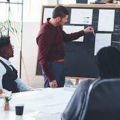 Putting together their plan of action | Buy Stock Photo on PeopleImages ...