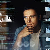 Trying to figure out the codes | Buy Stock Photo on PeopleImages ...
