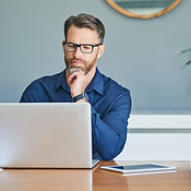 Getting some work done at home | Buy Stock Photo on PeopleImages ...