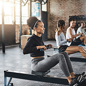 Rowing their way right towards their fitness goals | Buy Stock Photo on ...