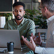 Teamwork keeps them on target | Buy Stock Photo on PeopleImages ...