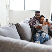 Scrolling through all the funny memes | Buy Stock Photo on PeopleImages ...