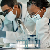 Performing accurate tests | Buy Stock Photo on PeopleImages, Picture ...