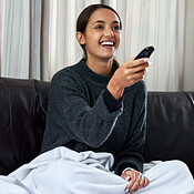 This the most riveting show | Buy Stock Photo on PeopleImages, Picture ...