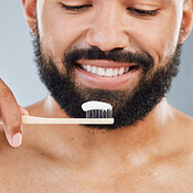 Just the right amount of toothpaste | Buy Stock Photo on PeopleImages ...