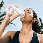 Staying hydrated in the sun | Buy Stock Photo on PeopleImages, Picture ...