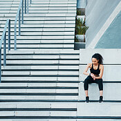 Checking her progress | Buy Stock Photo on PeopleImages, Picture And ...