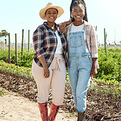 Two farmers embracing. Portrait of two happy farmers. Farmers standing ...