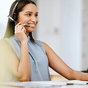 Call center agent, business consultant or telemarketer assisting client ...