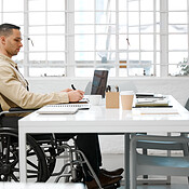 Wheelchair, disabled and handicap business man working, planning and ...