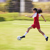 Football, soccer and running girl with a ball doing a sport exercise ...
