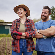 Sustainability, agriculture and farmer couple on a farm growing ...