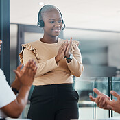 Call center support team clapping hands in congratulations and ...