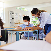 Covid learning with teacher and school students having lesson, study ...