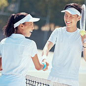 Tennis, handshake and teamwork with a health athlete or coach shaking ...