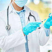 Covid vaccine, medical doctor with medicine syringe and pharma ...