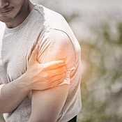 Arm, muscle or pain injury of man during fitness, workout or outdoor ...