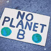 Cardboard poster, billboard or climate change sign on city street for ...