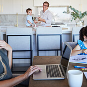 Family children learning mother work from home on laptop and father ...
