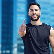 Man, thumbs up or fitness success in city workout, training or exercise ...
