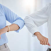 Covid, arms and elbow greeting for business safety, rules and regulations for compliance at the ...