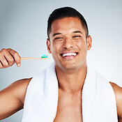 Mouth, dental and man brushing teeth in studio for hygiene, wellness ...