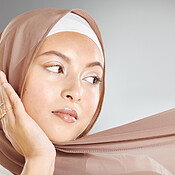 Face, beauty and skincare of muslim woman isolated against gray studio ...