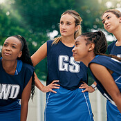 Teamwork, netball and women in a huddle for motivation, team building ...