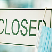 Closed sign, business and covid crisis background at store, shop of ...