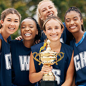 Trophy, sports and winner women team celebration portrait for ...