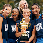 Women, team and winner trophy in fitness game, training match or ...