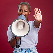 Black woman, protest and shouting with megaphone for voice, strike or ...