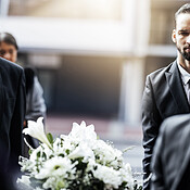 Man, funeral and carrying coffin in grief for loss, death or sorrow ...