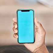 Blue screen, phone and mockup in hand of man showing marketing logo ...