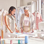 Teamwork, collaboration and fashion designer team working on a new ...