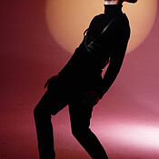 Man, fashion and pose of an aesthetic, stylish male model posing on a ...